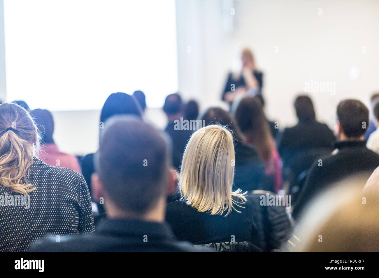 Woman giving presentation on business conference workshop Stock Photo ...