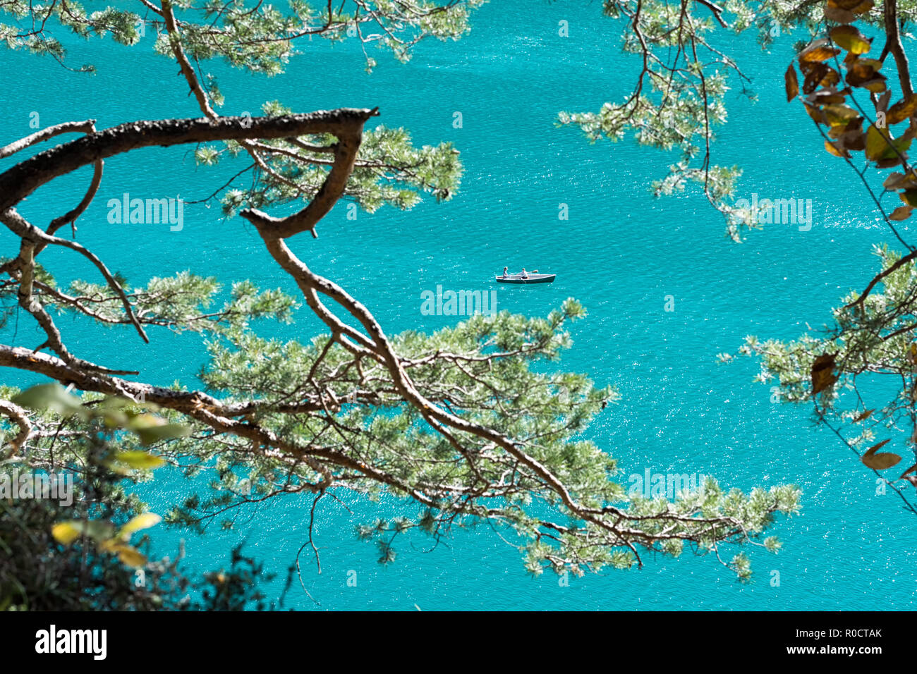 View of the turquoise-coloured lake "Alpsee" and the Alpseebad from a ...