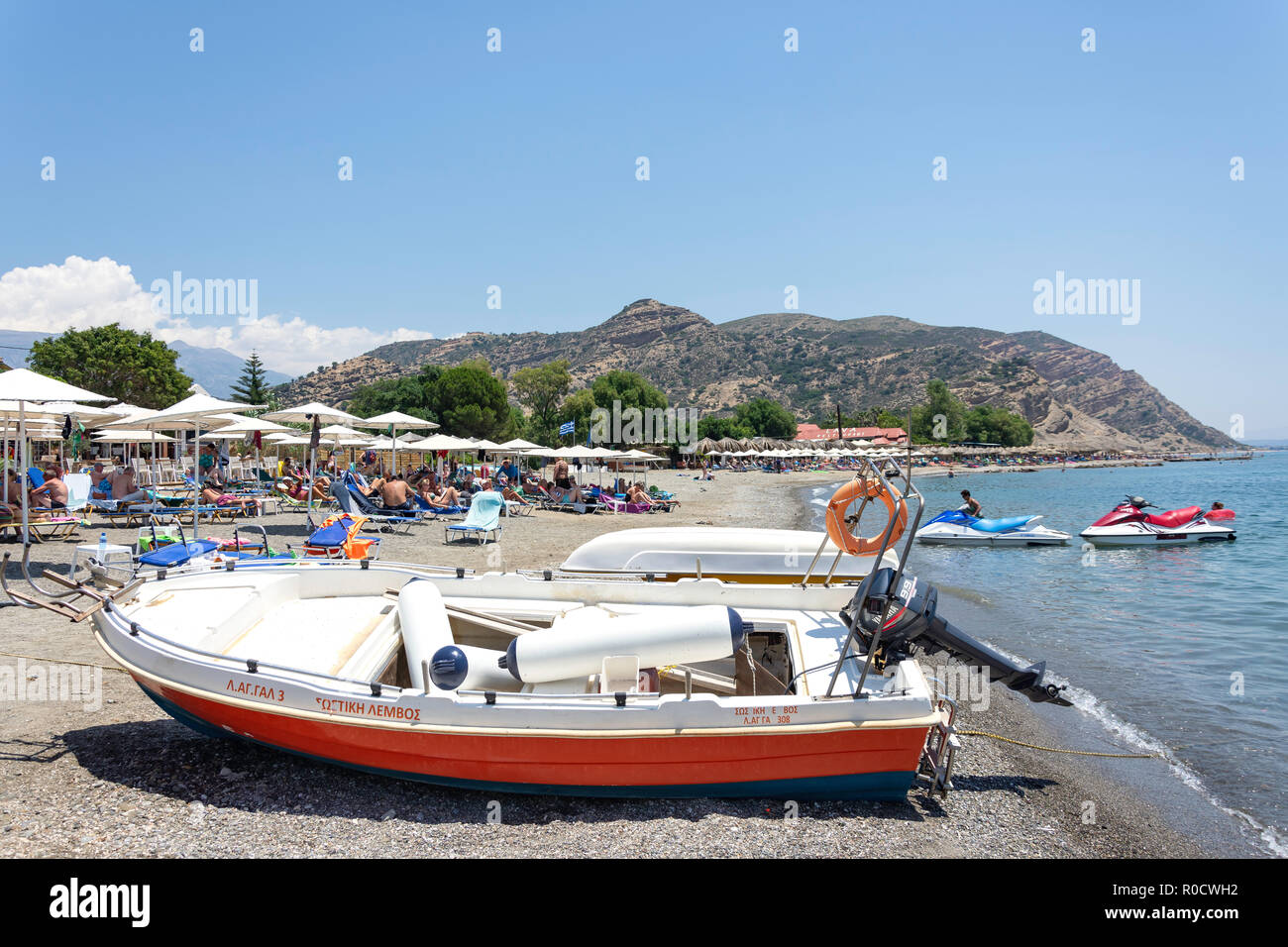 Speed boat beach beaches parasols small sunbeds agia galini vill hi-res ...