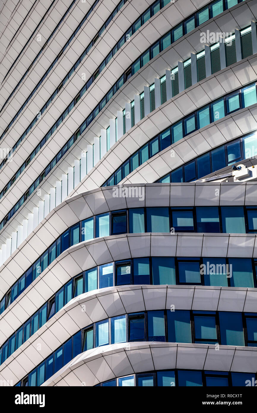 Geometric architectural curves and lines of a modern office building in ...
