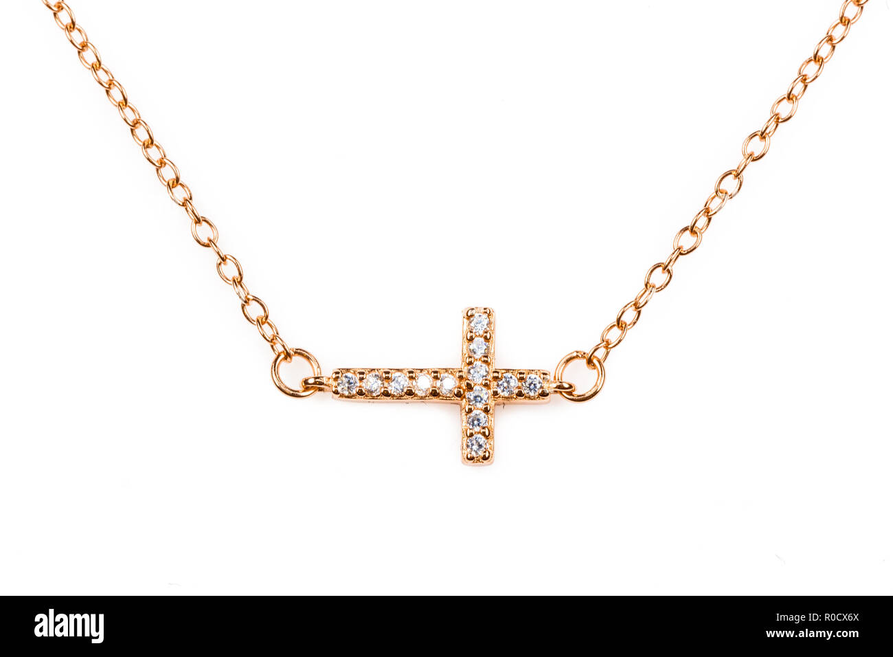 Cross on a chain Cut Out Stock Images & Pictures - Alamy