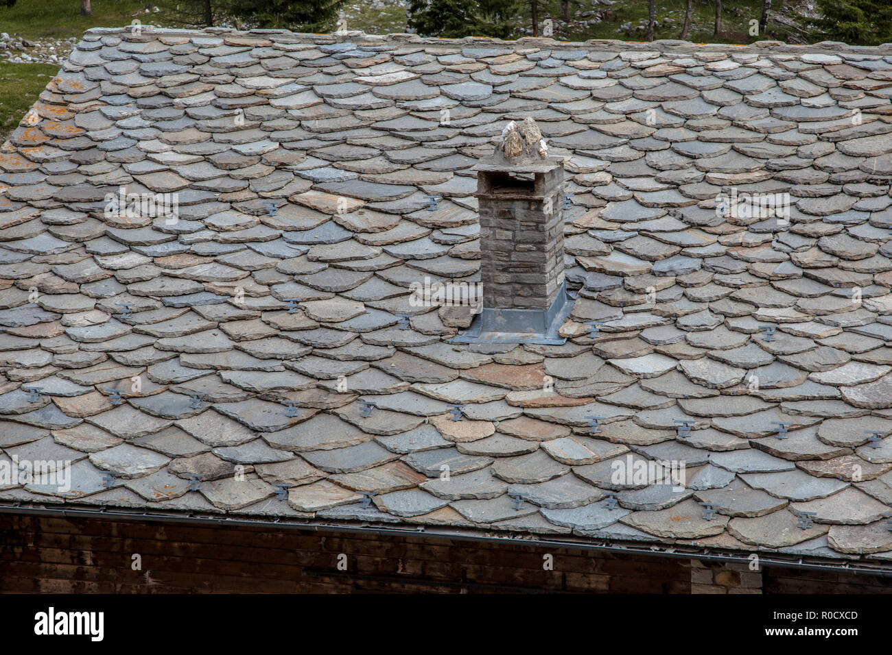 Schist Roof Tiles Being Installed on a New House Stock Photo - Alamy