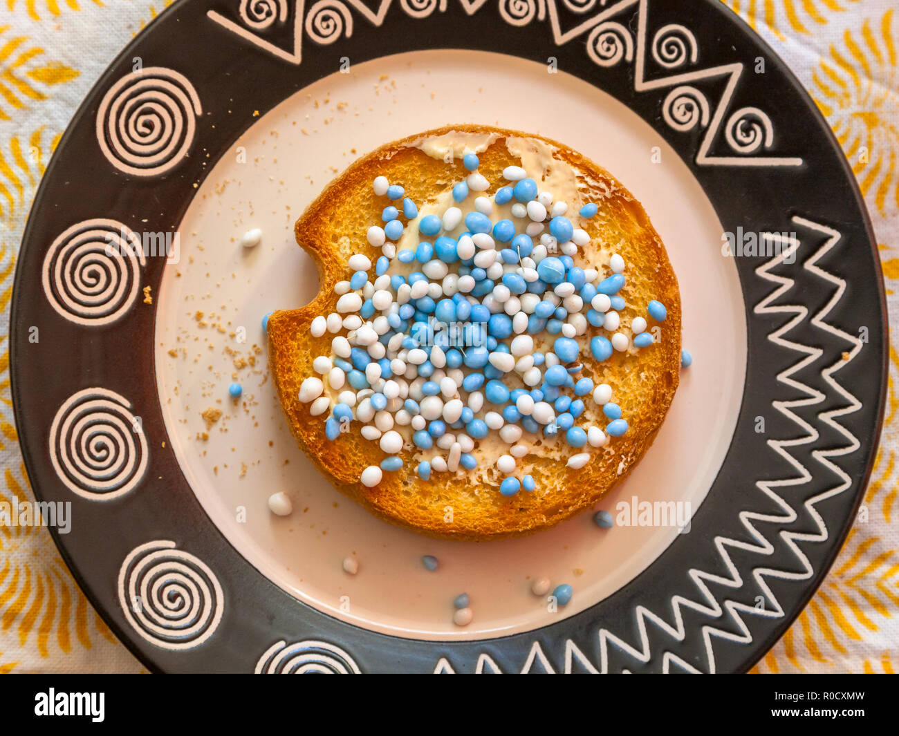 Rusks with white and blue anise seed sprinkles served in Holland when a ...