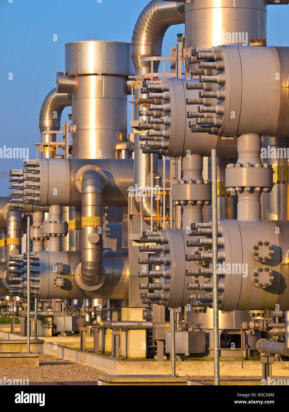 Close up detail of pipe flanges and valves from a chemical industry ...