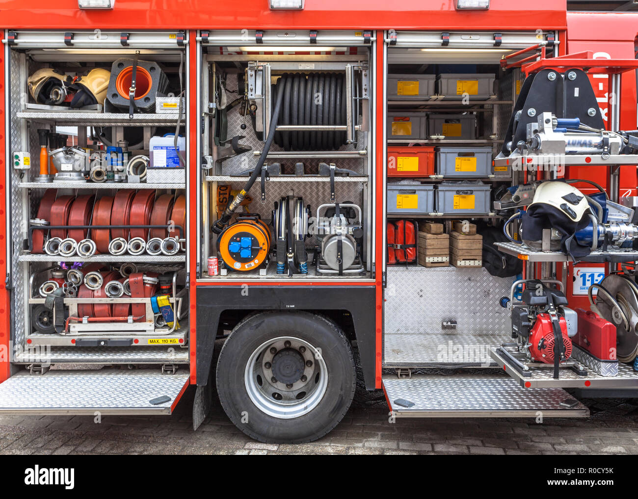 Hoses, Valves and other Inventory of a Fire Engine Stock Photo - Alamy