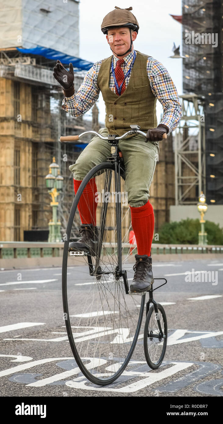 Man on unicycle vintage hi-res stock photography and images - Alamy