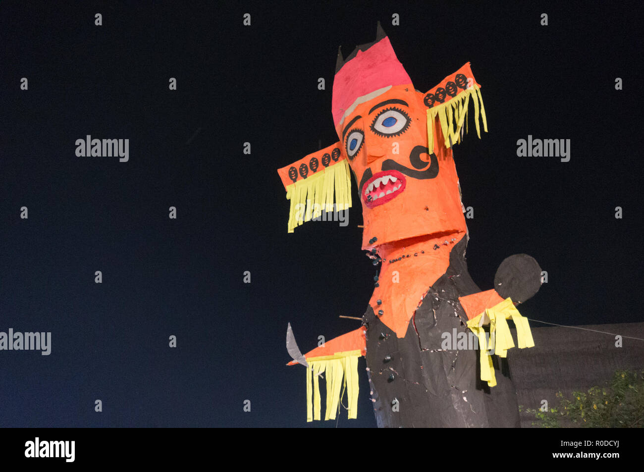 Ravan Ravana effigy standing against night sky on dussera Stock Photo ...