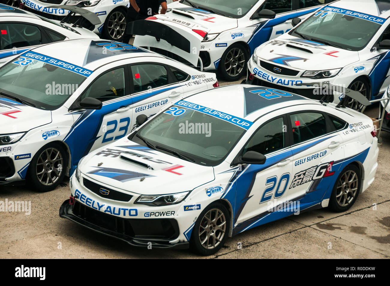 Geely Emgrand GL race cars in the pit area of the Shanghai Circuit ...