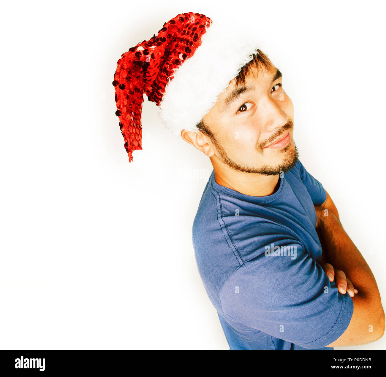 funy exotical asian Santa claus in new years red hat smiling Stock ...