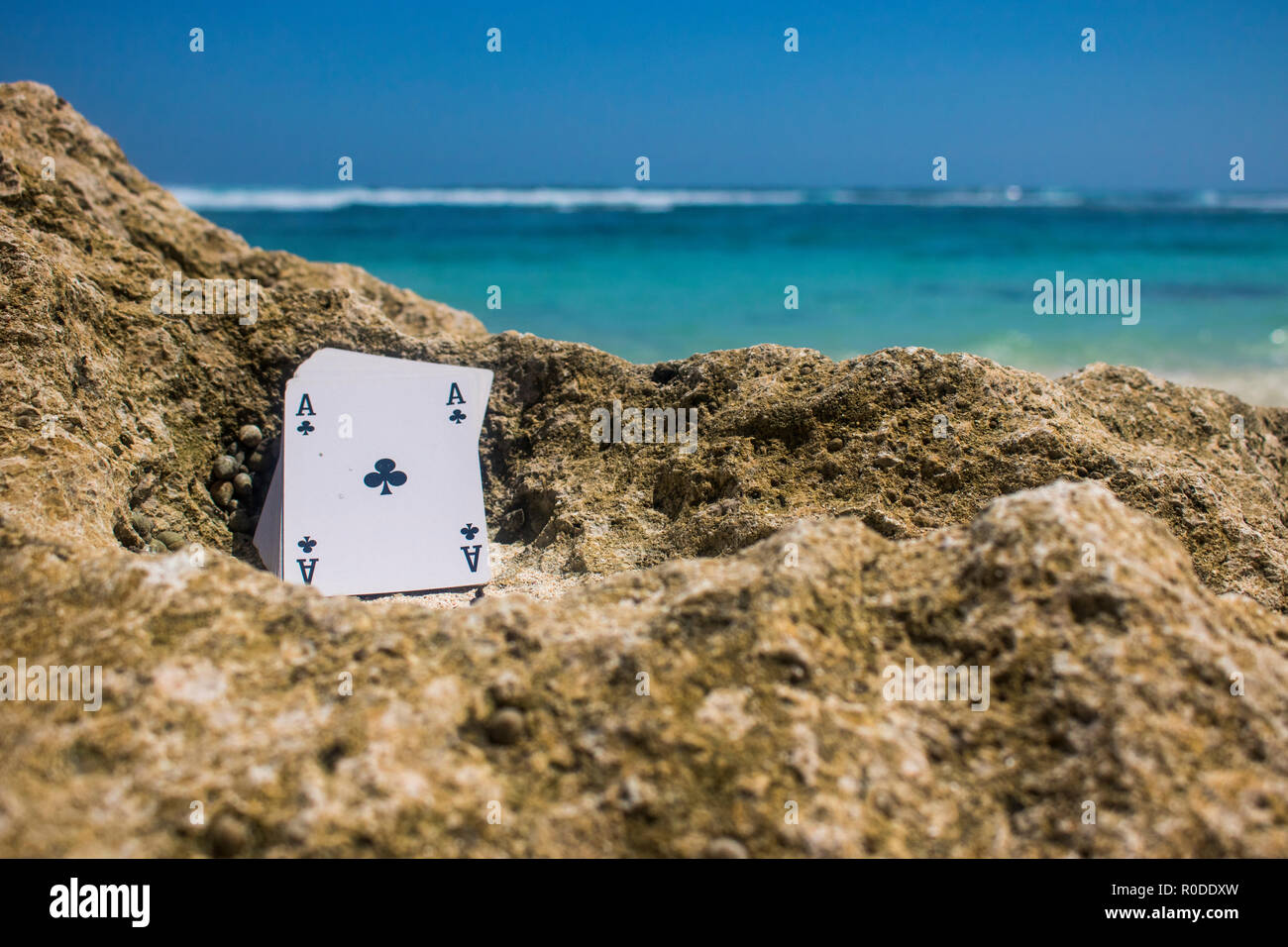 ace of club poker card beach theme photo Stock Photo - Alamy
