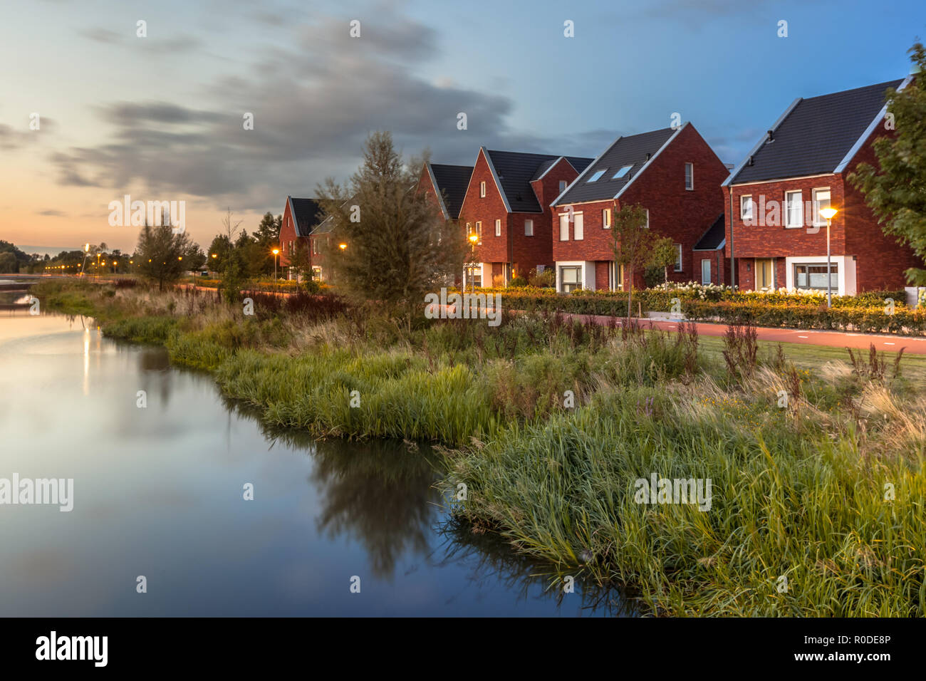 Long exposure night shot of a Street with modern ecological middle ...