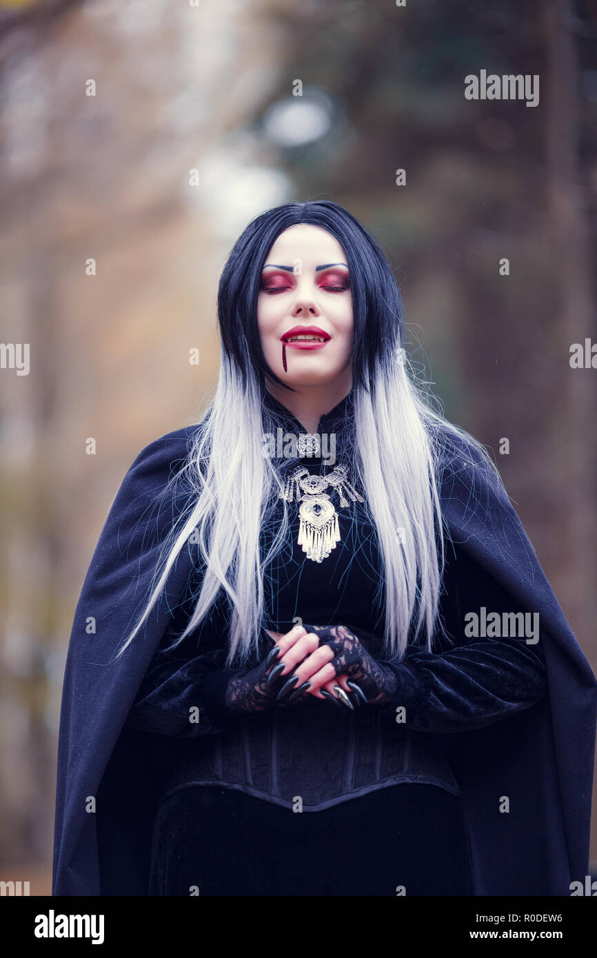 Female vampire blood face hi-res stock photography and images - Alamy