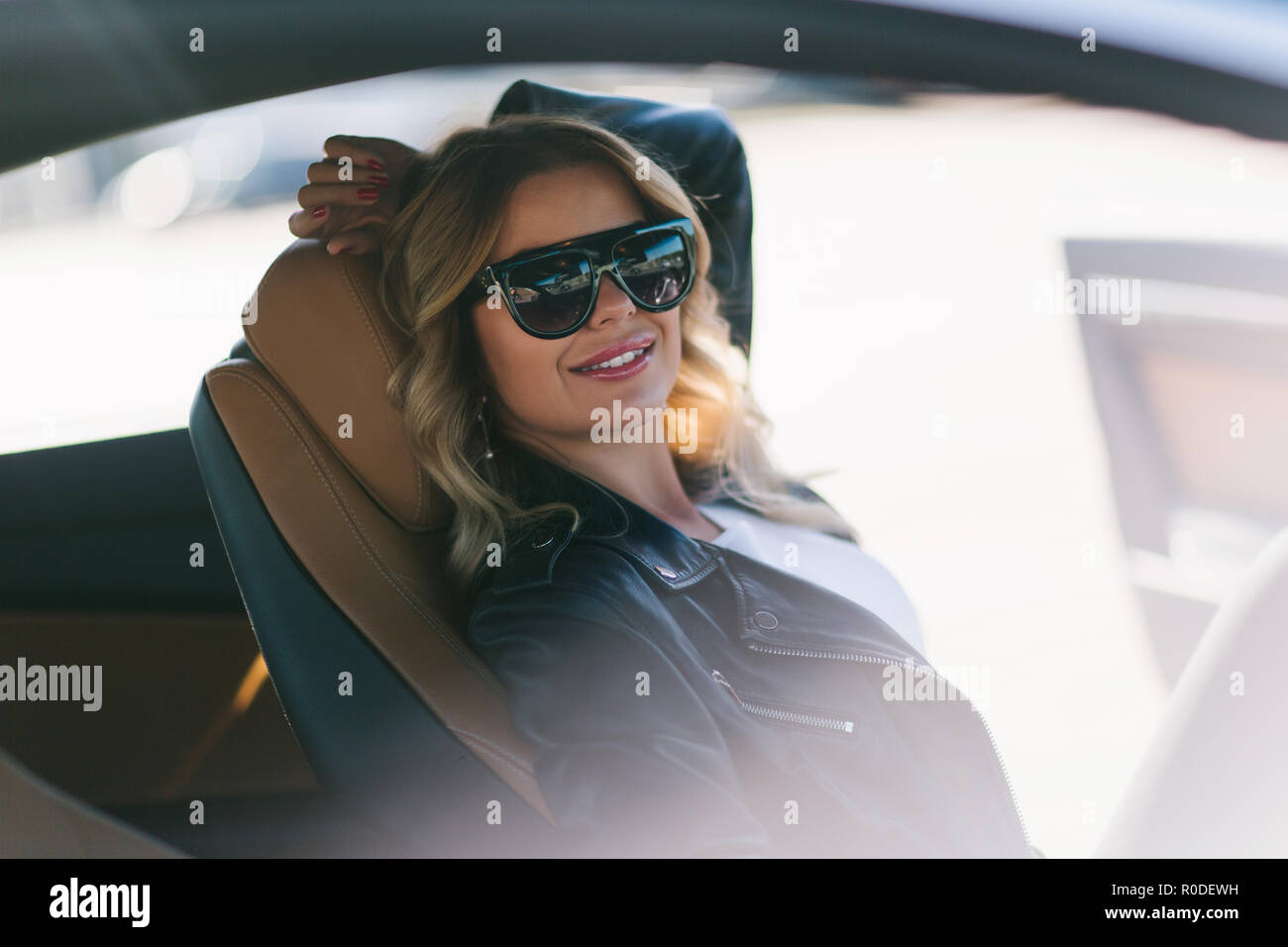 Girl behind steering wheel hi-res stock photography and images - Alamy