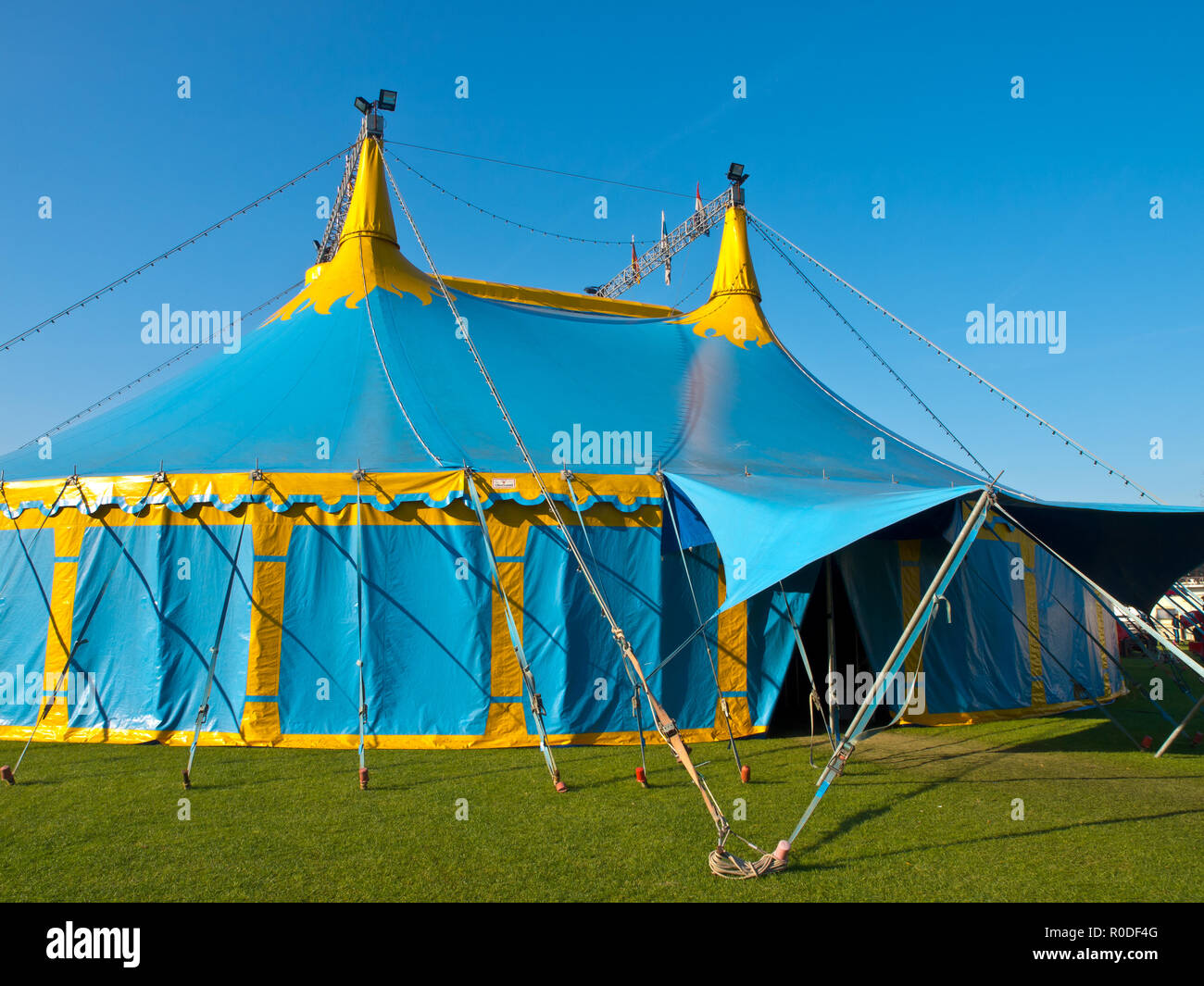 Blue and yellow big top circus tent Stock Photo - Alamy
