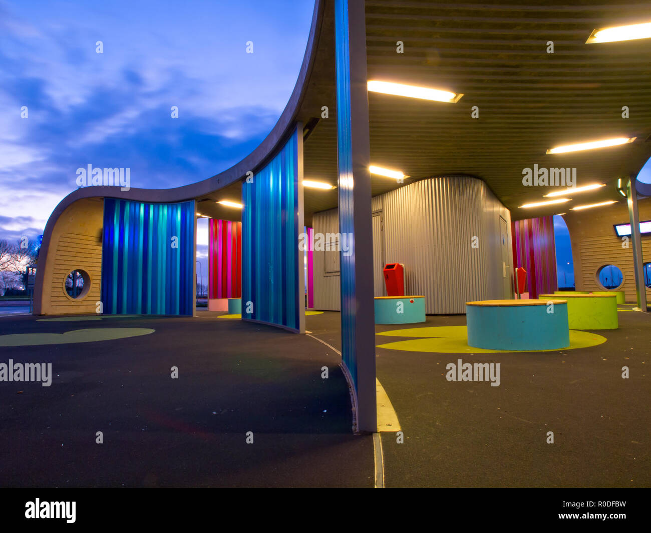 Modern busstation waiting area with chairs Stock Photo - Alamy