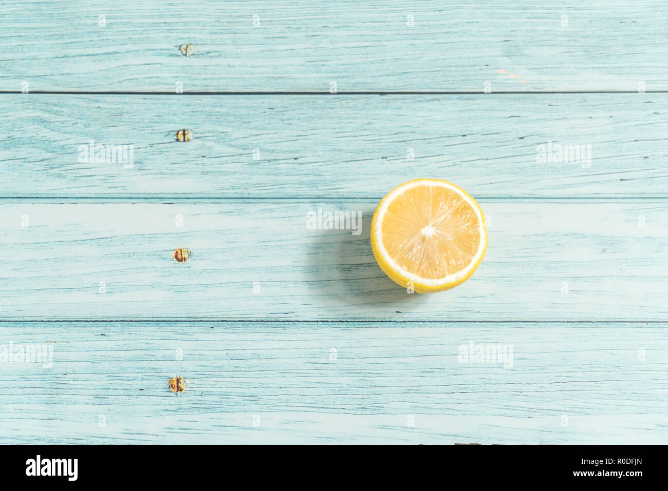 Lemon and cyan background Stock Photo - Alamy