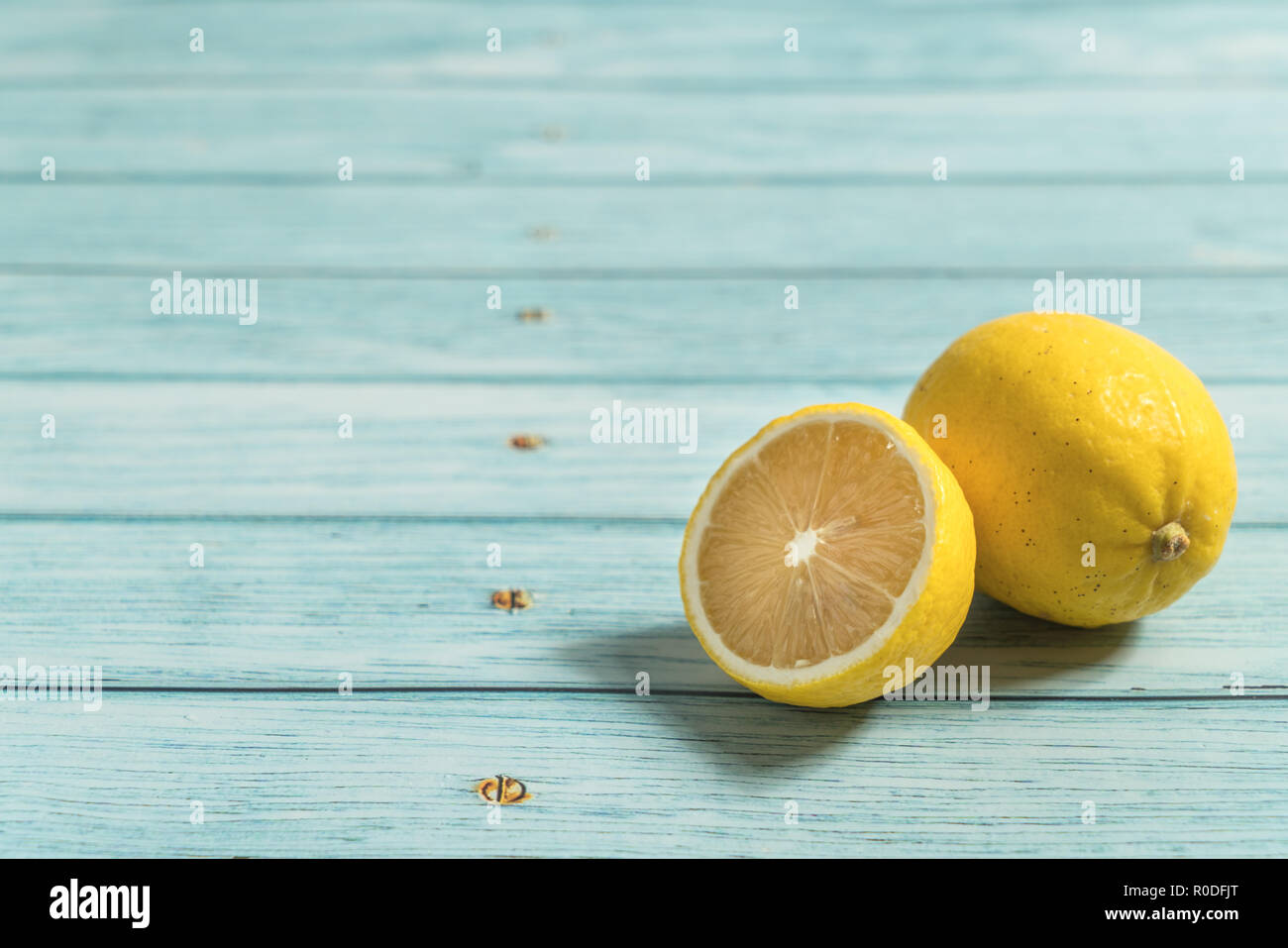 Lemon and cyan background Stock Photo - Alamy