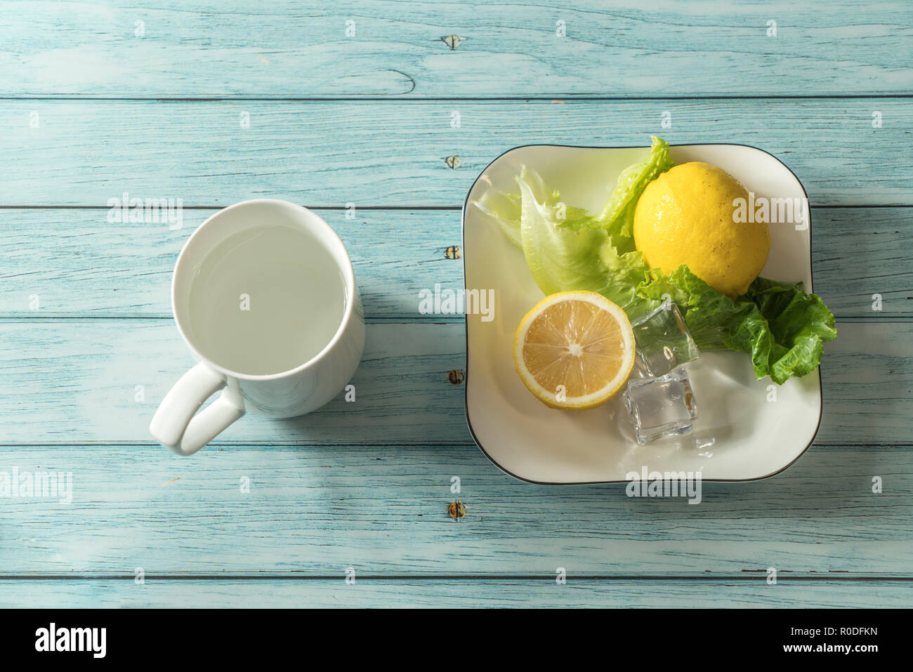 Lemon and cyan background Stock Photo - Alamy