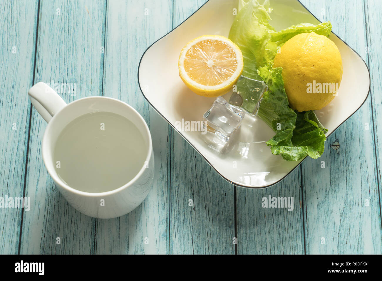 Lemon and cyan background Stock Photo - Alamy