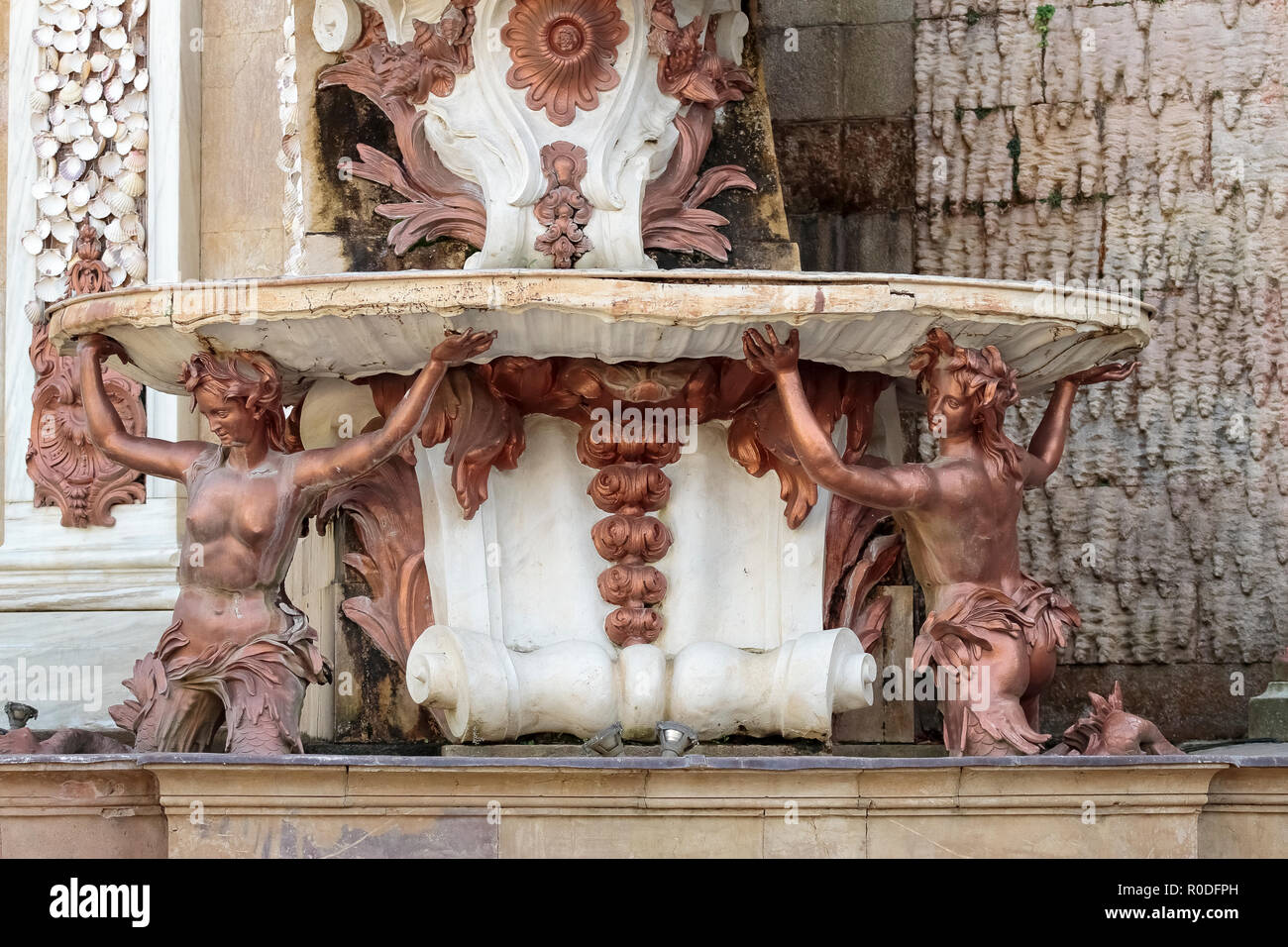 scene with two maids made of painted lead in the fountain the baths of ...