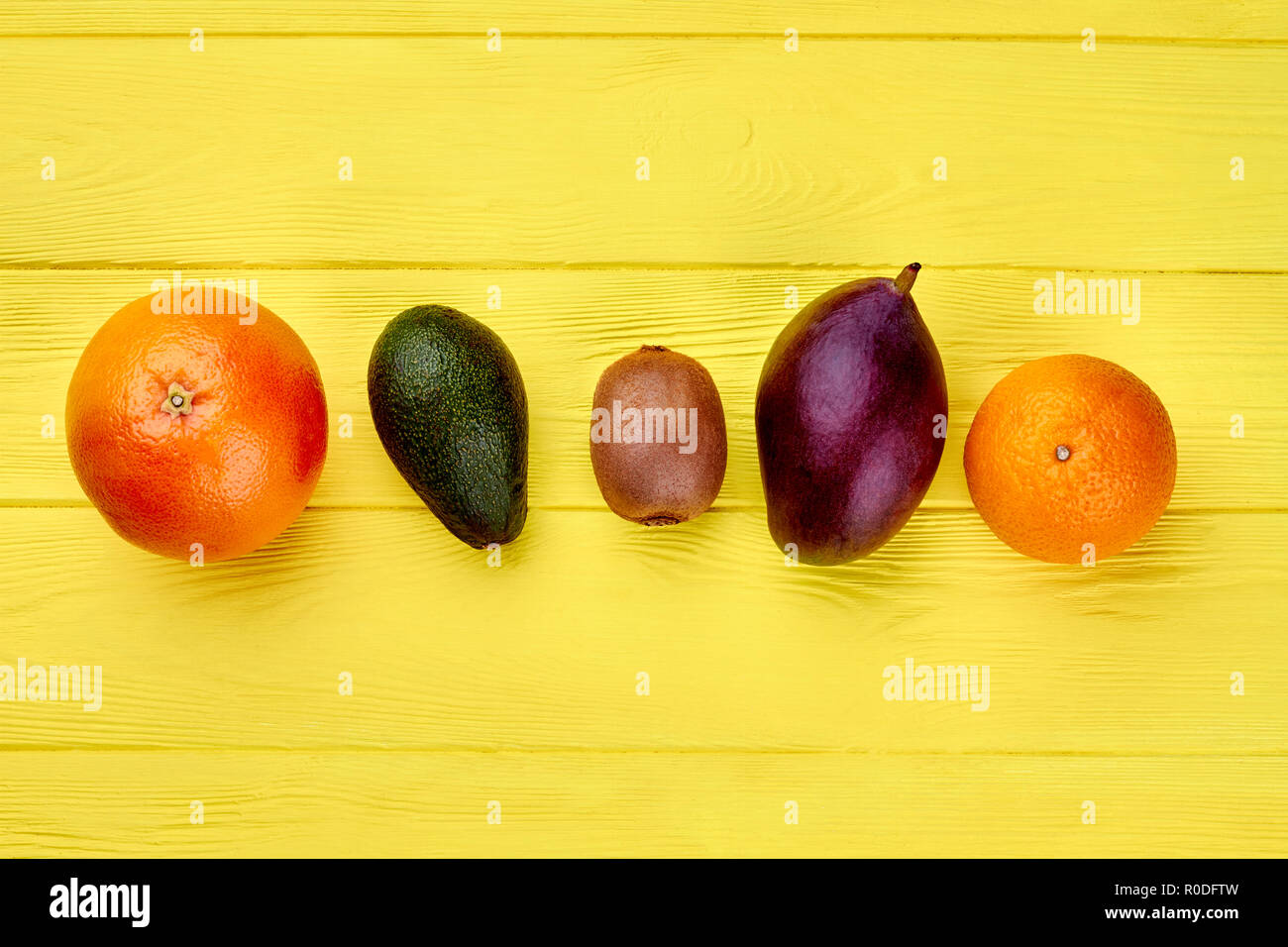 Row of vibrant tropical fruits Stock Photo - Alamy