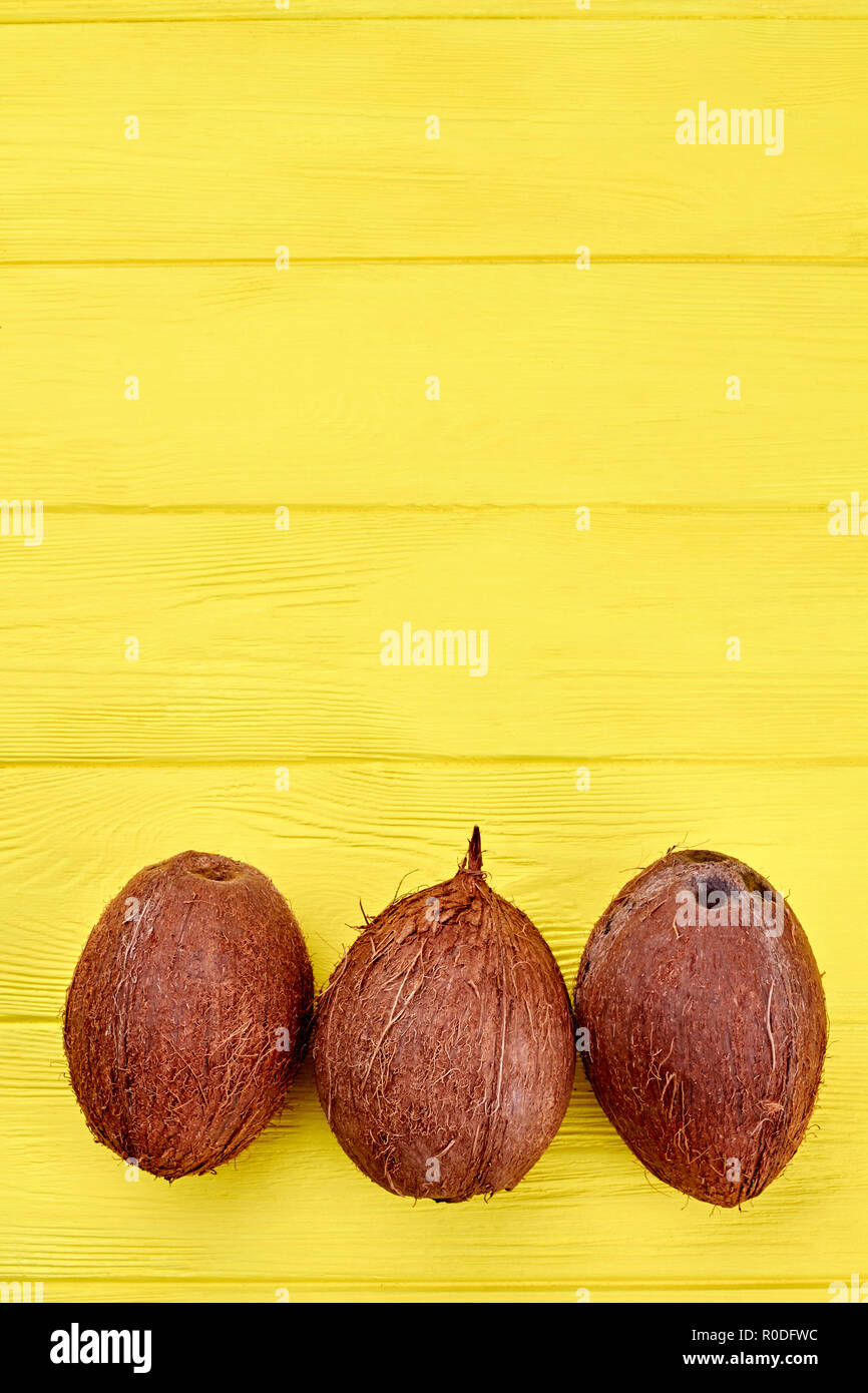 Three coconuts with copy space on top Stock Photo - Alamy