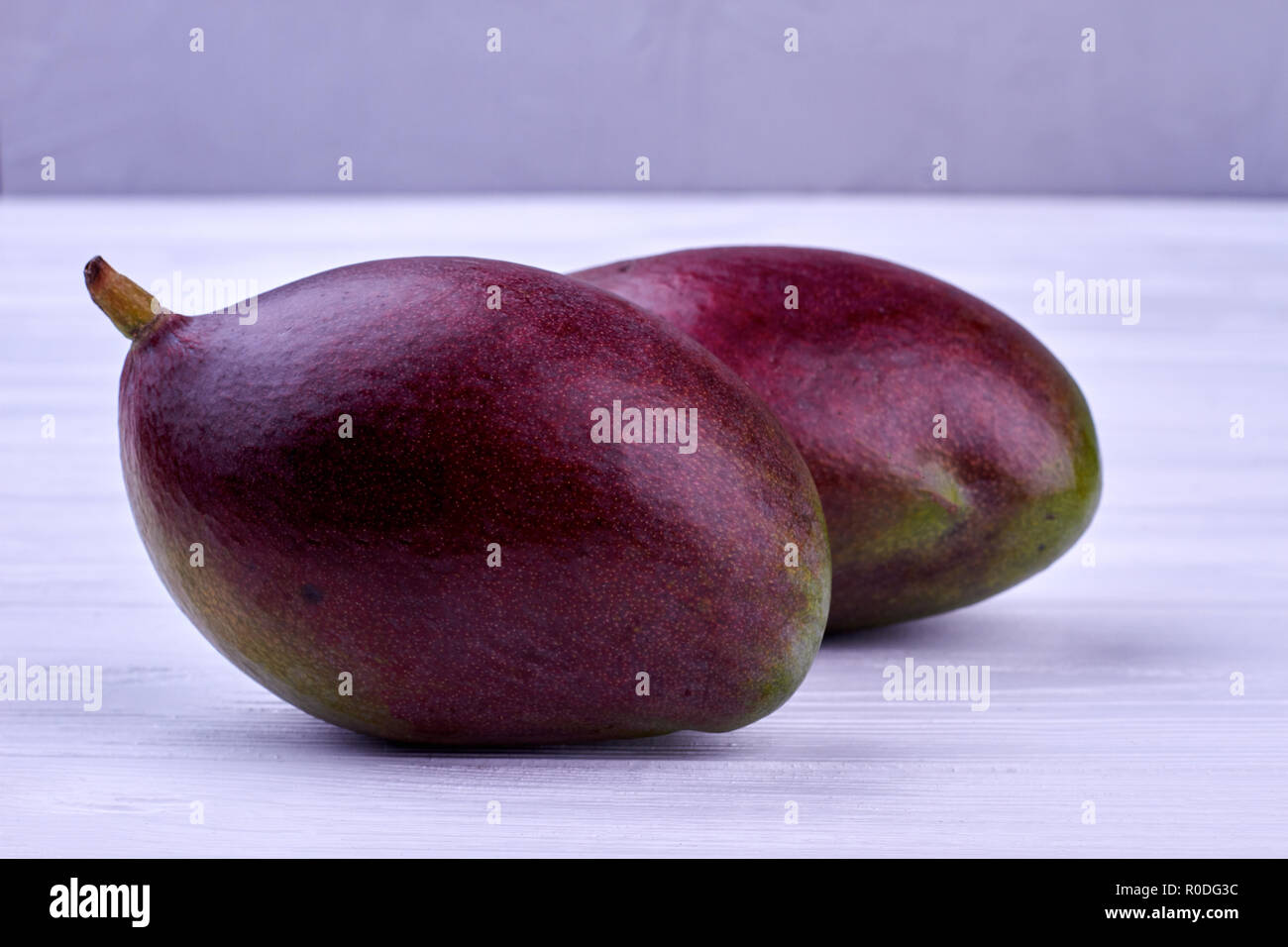 Two fresh mango fruits Stock Photo - Alamy