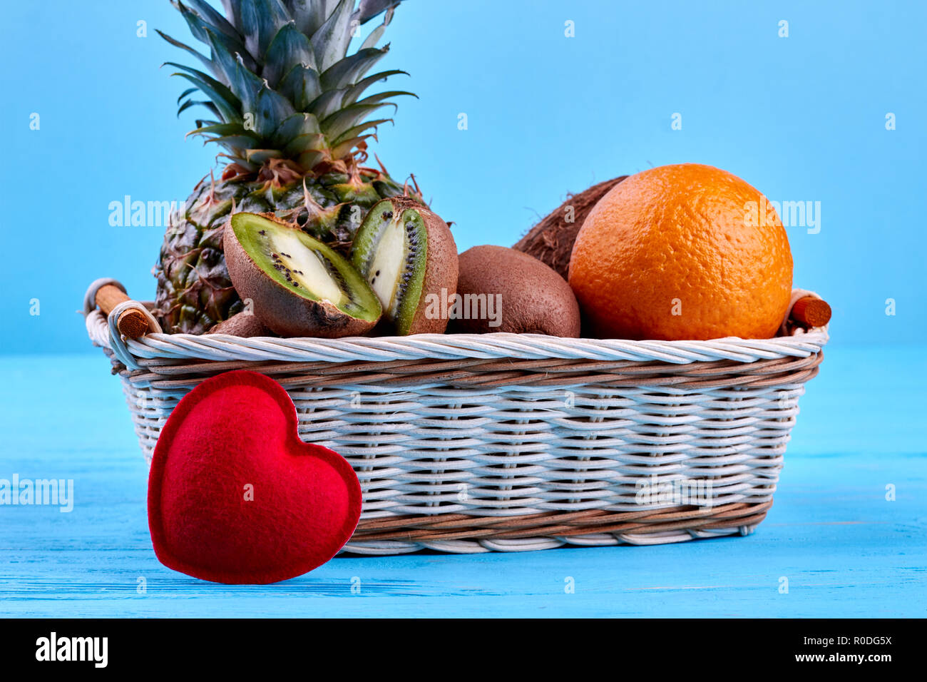 Composition from colorful fruits in basket Stock Photo - Alamy