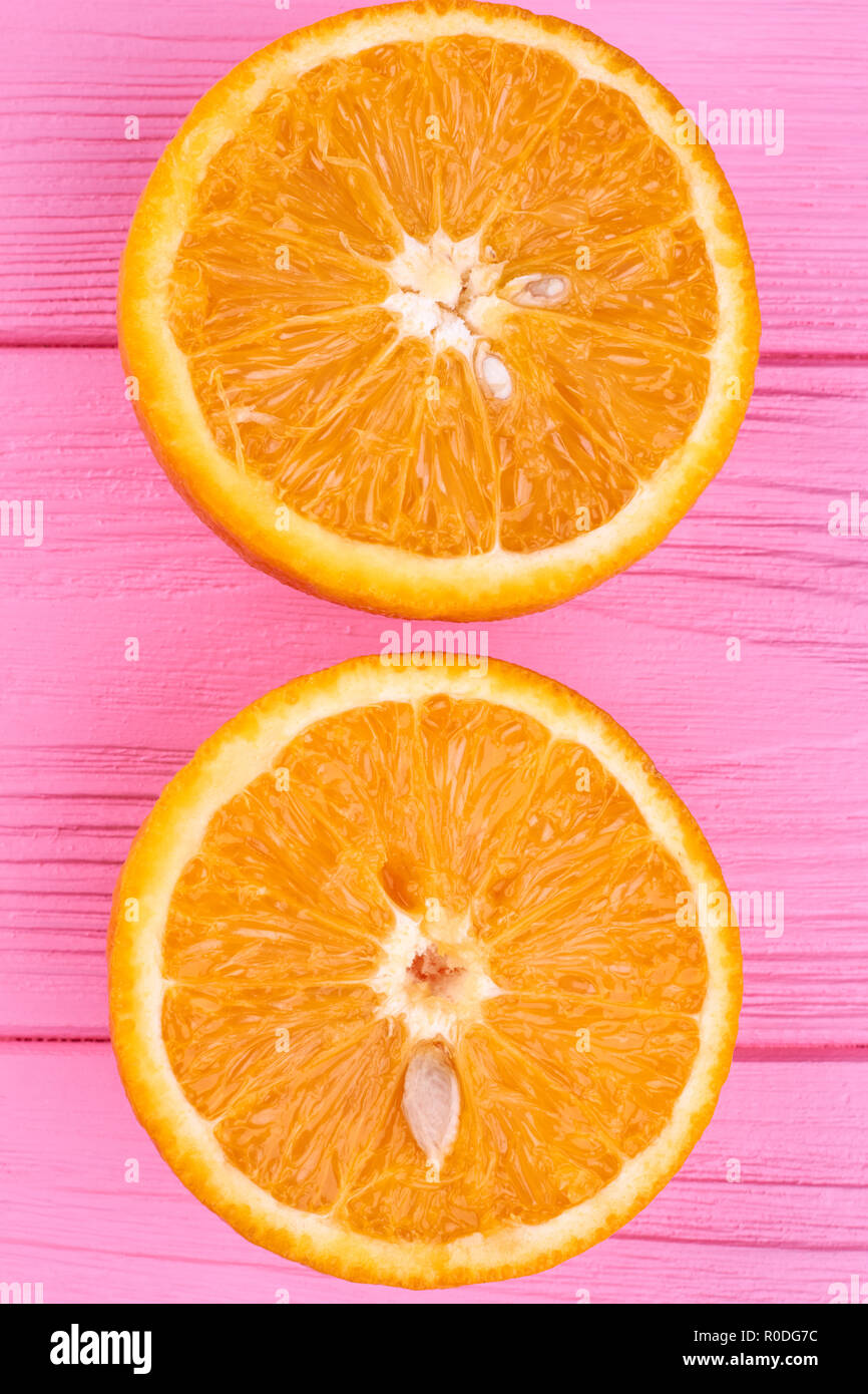 Two juicy halves of oranges, top view Stock Photo - Alamy