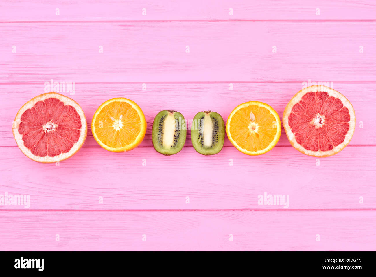 Row of colorful citrus fruits, top view Stock Photo - Alamy