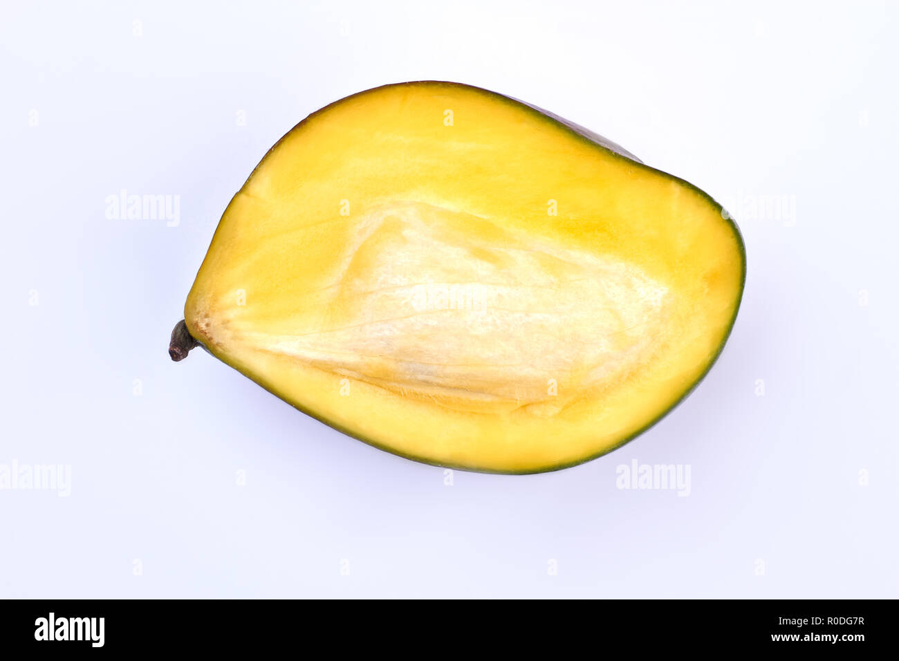 Half mango fruit seed hi-res stock photography and images - Alamy