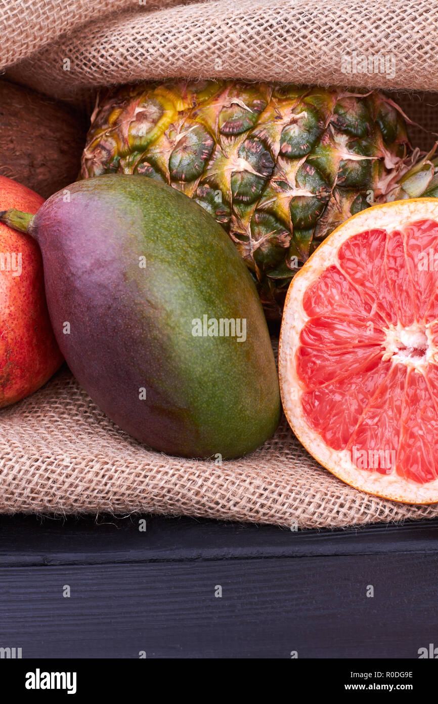 Healthy tropical fruits and burlap Stock Photo - Alamy