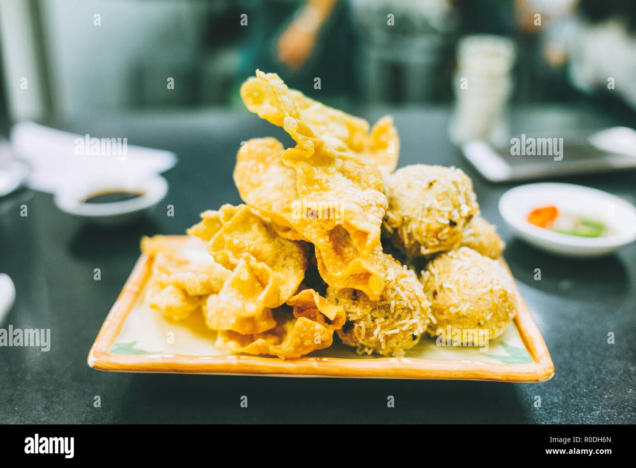 Fried wanton and fish ball snack in Macau Stock Photo - Alamy