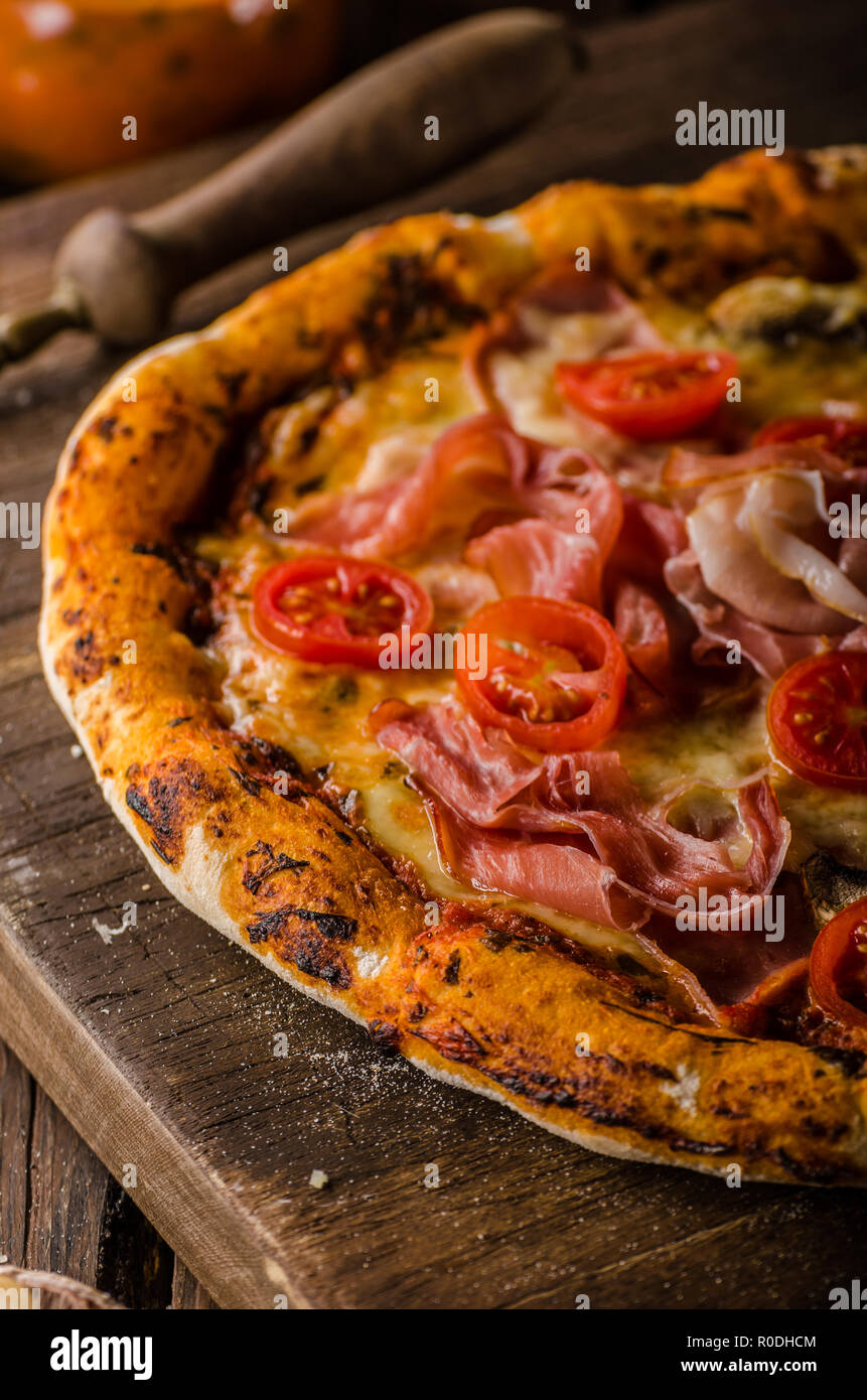 Rustic old style vintage pizza, wood board, fresh food Stock Photo - Alamy