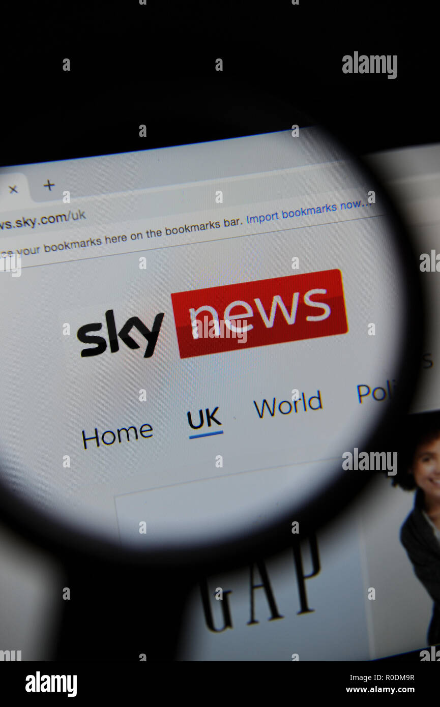 The Sky News website seen through a magnifying glass Stock Photo - Alamy