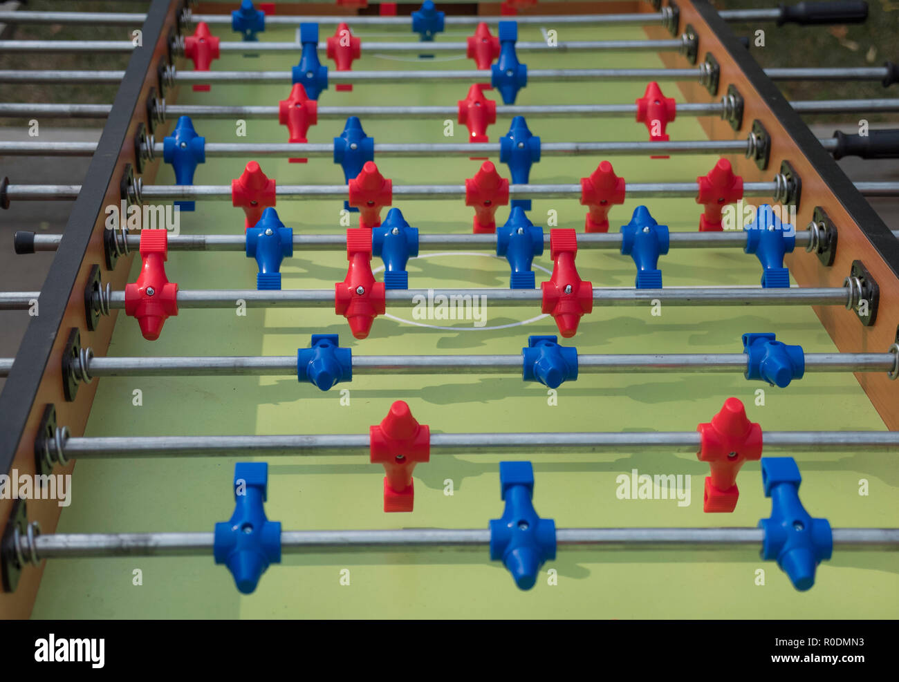 Table football in the entertainment center. Close-up image of plastic ...