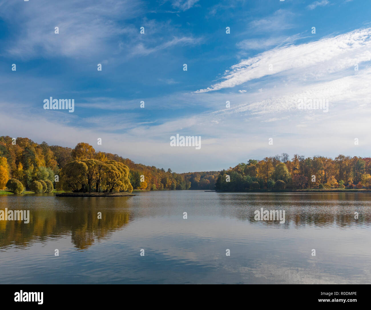 Autumn foliage with water reflection natural landscape Stock Photo - Alamy