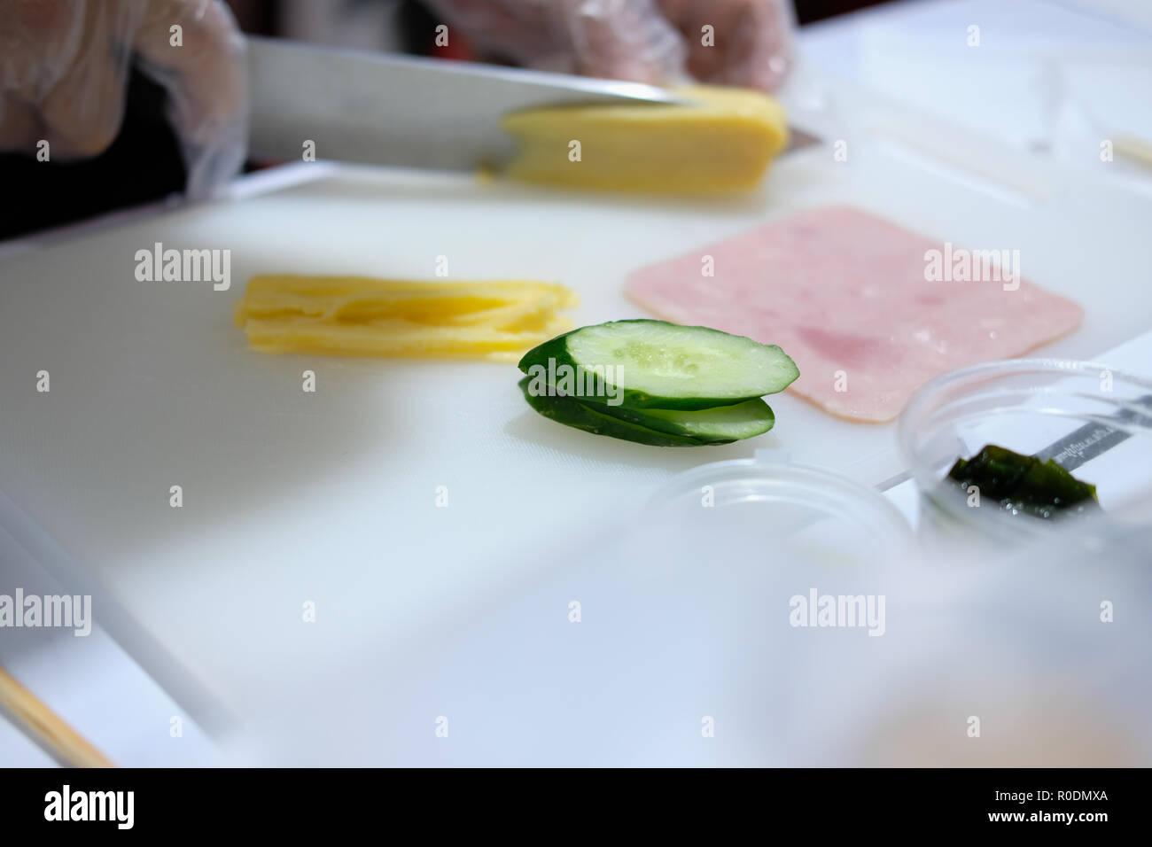 chef cutting egg for making chilled cold somen noodle. japanese food ...