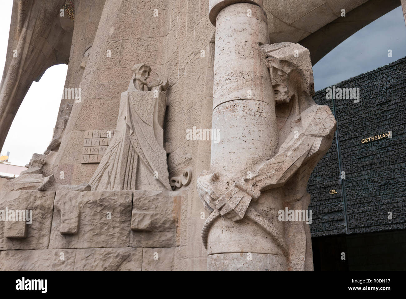 Sculpture of Jesus tie to a column at the entrance of the Sagrada Familia, Barcelona, Spain ...