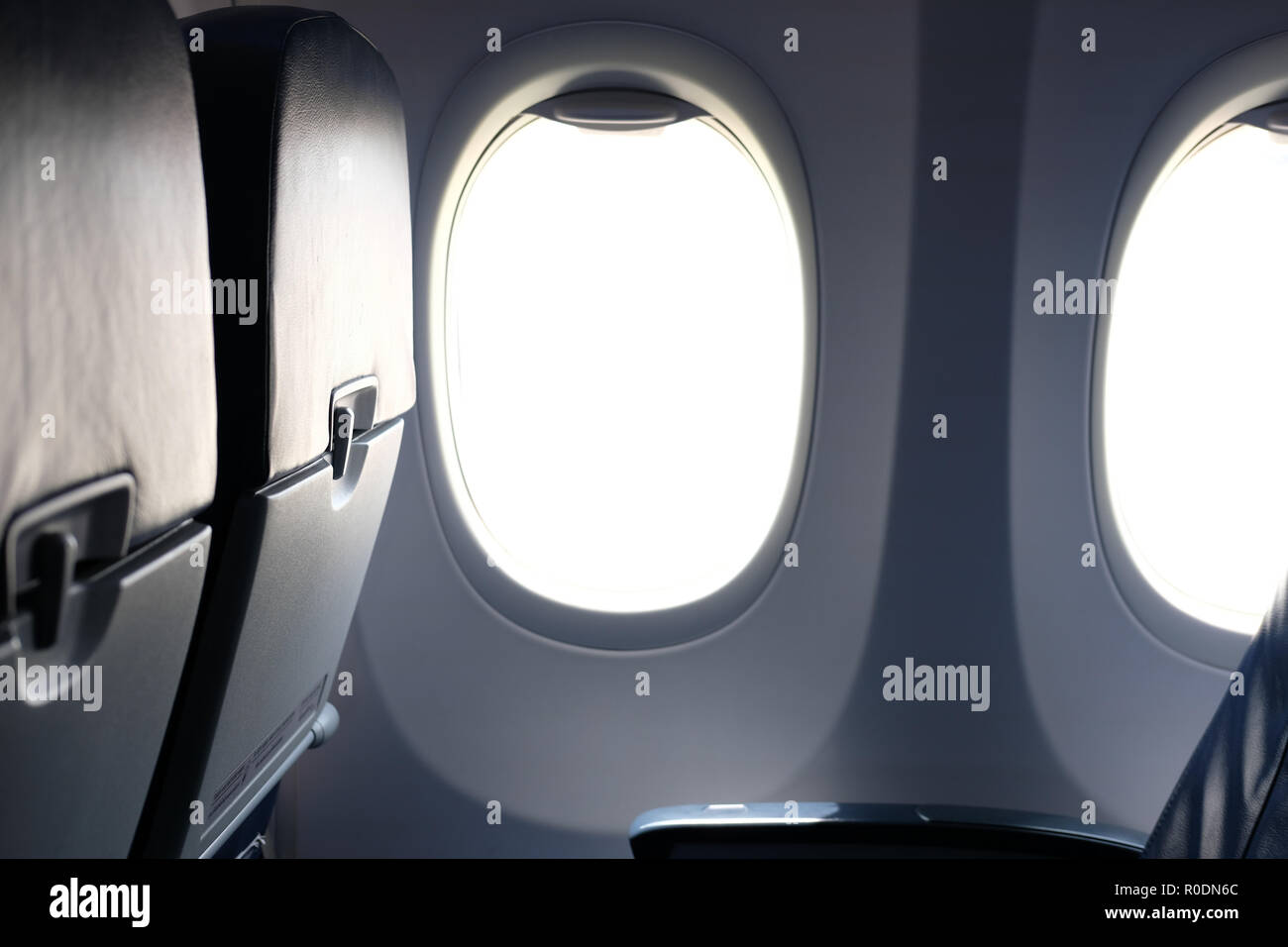 airplane window inside cabin. aircraft porthole opening Stock Photo - Alamy