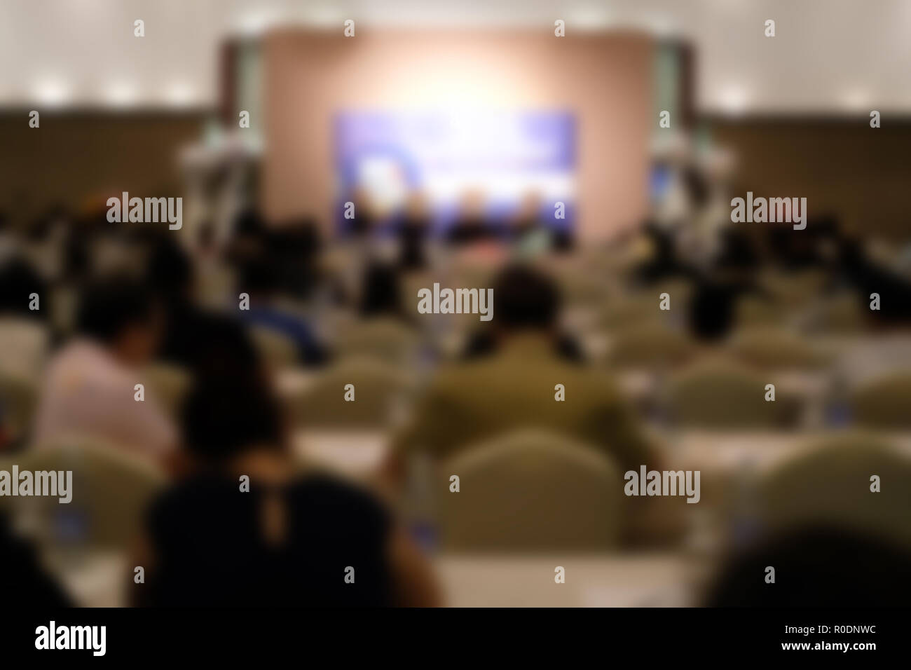 audience & stage in seminar conference room. blur background Stock ...