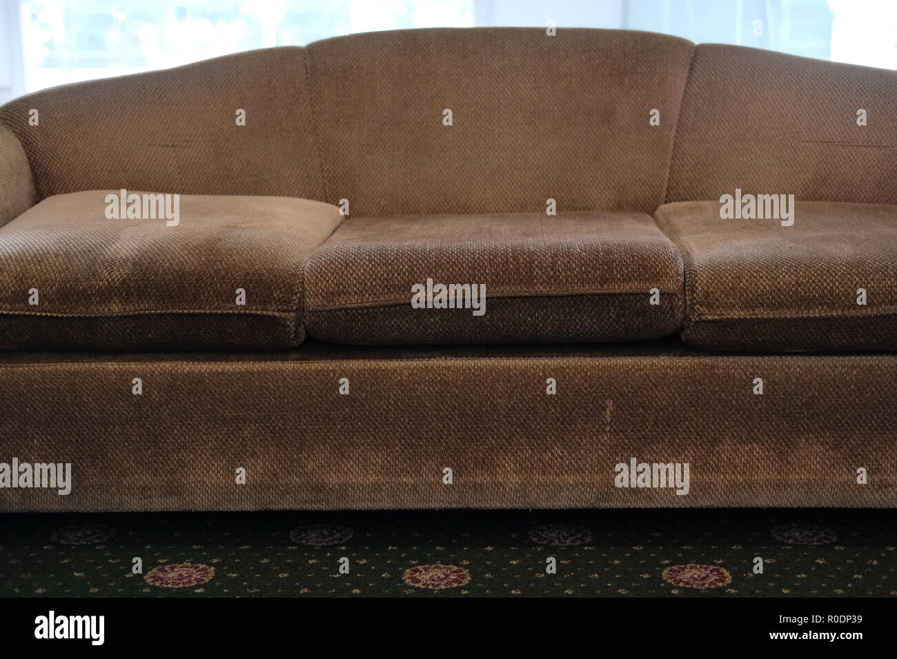 Living room interior with brown fabric sofa Stock Photo - Alamy