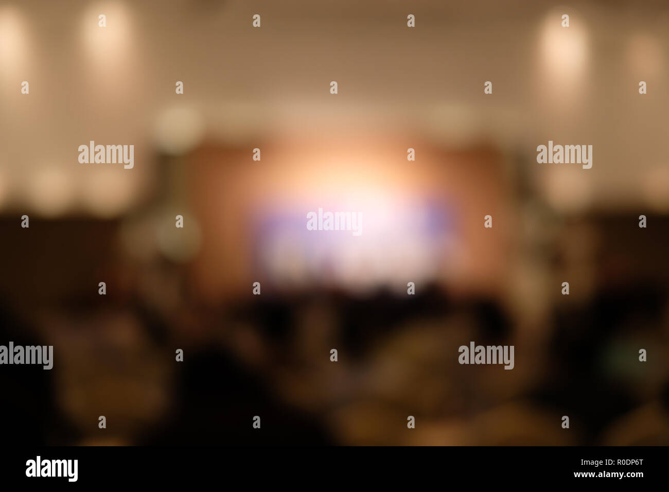 audience & stage in seminar conference room. blur background Stock ...