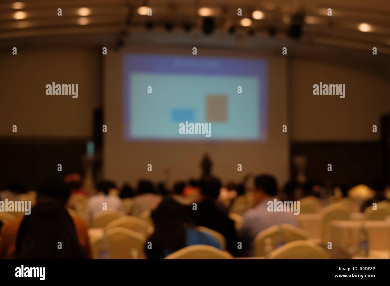 audience & stage in seminar conference room. blur background Stock ...