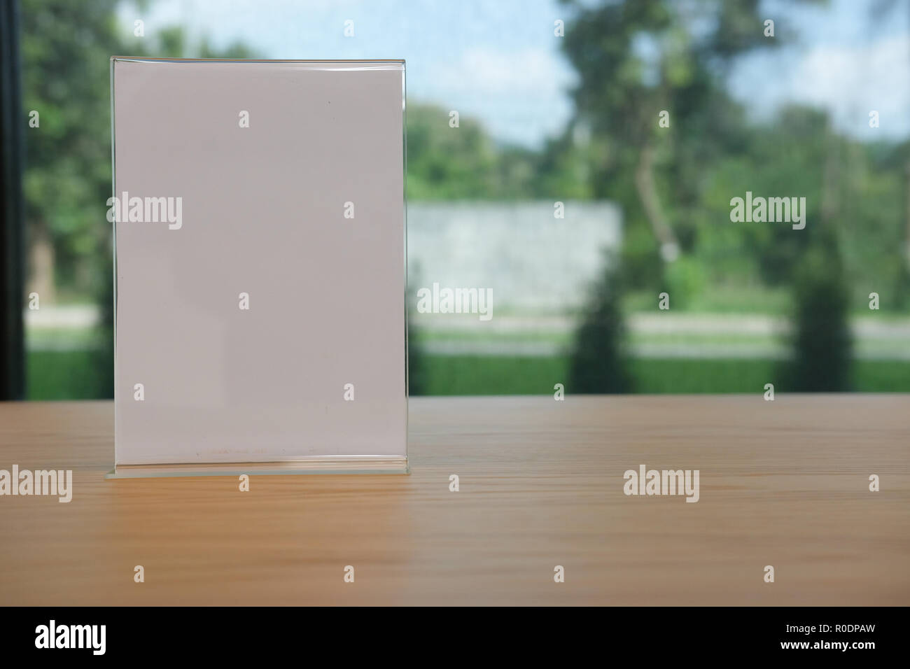 white label in cafe. display stand for acrylic tent card in coffee shop ...