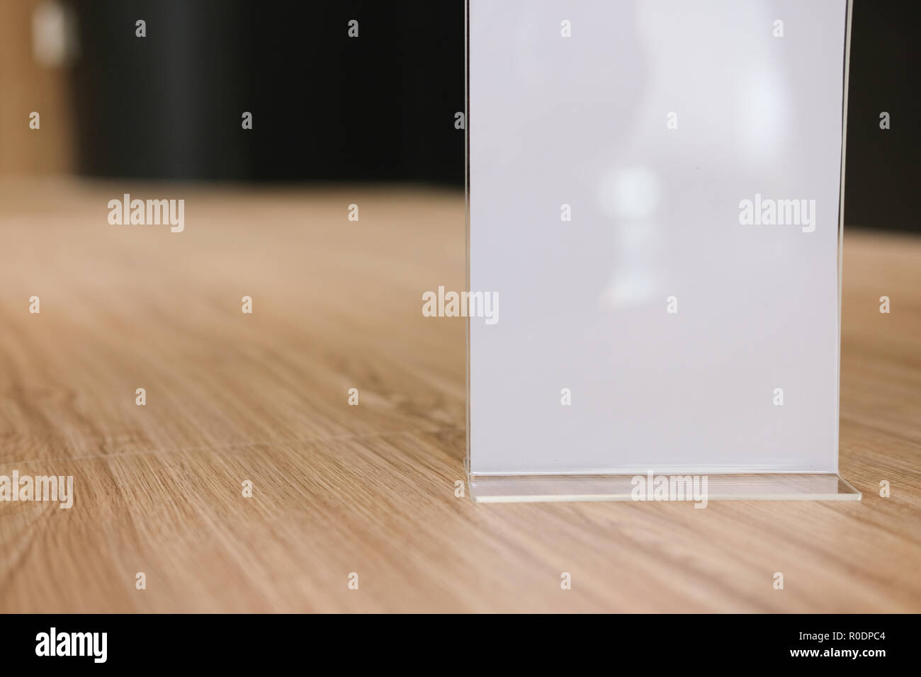 white label in cafe. display stand for acrylic tent card in coffee shop ...