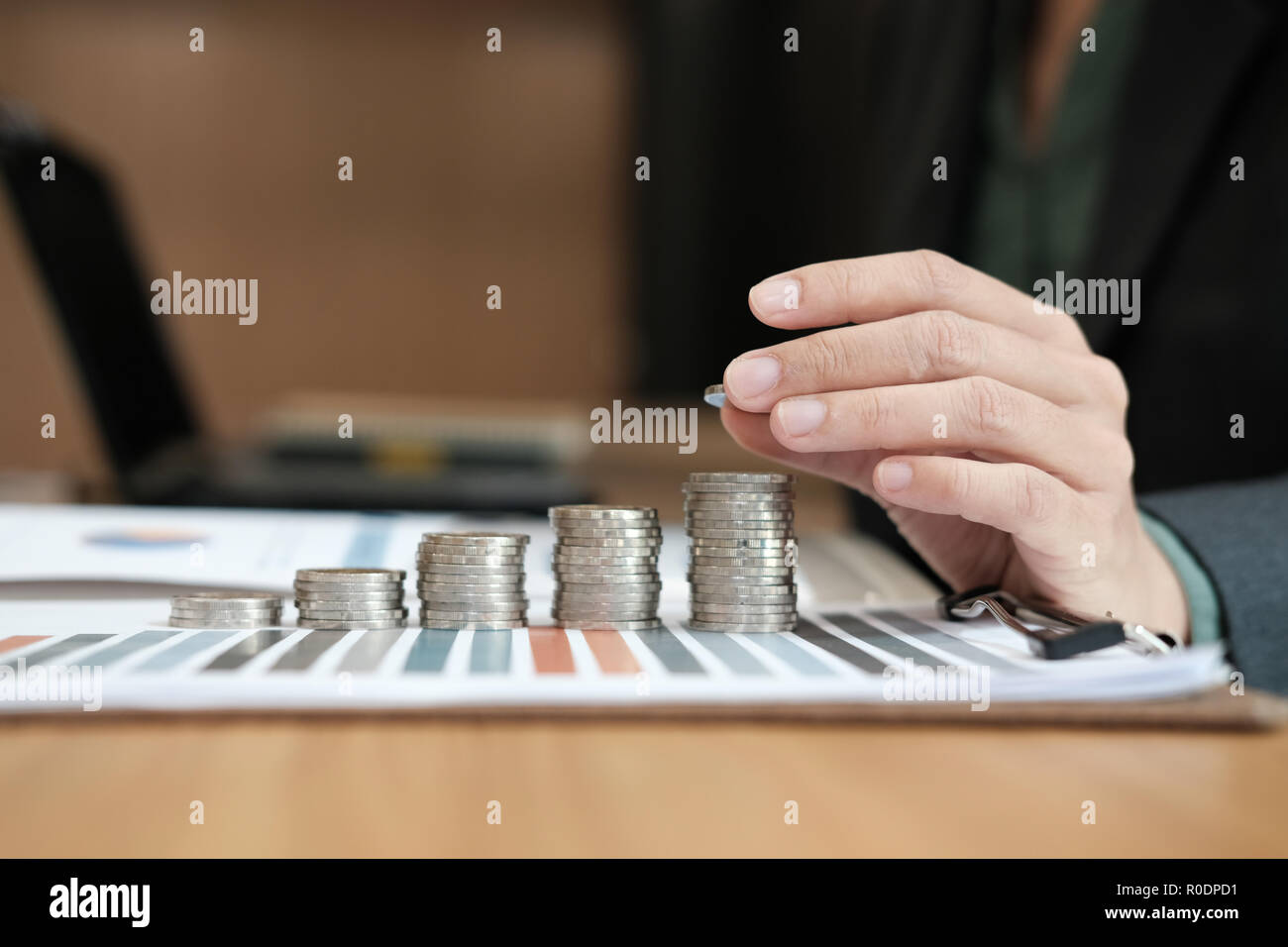 hand put coin on pile stack. money savings, cash deposit concept Stock ...