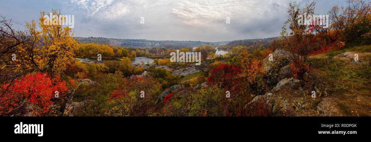 autumn yellow leaves panorama small river Southern Bug stones rocks ...