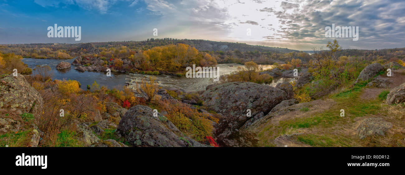 autumn yellow leaves panorama small river Southern Bug stones rocks ...