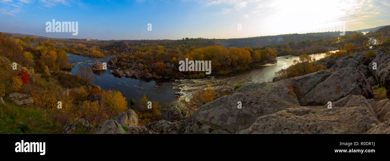 autumn yellow leaves panorama small river Southern Bug stones rocks ...